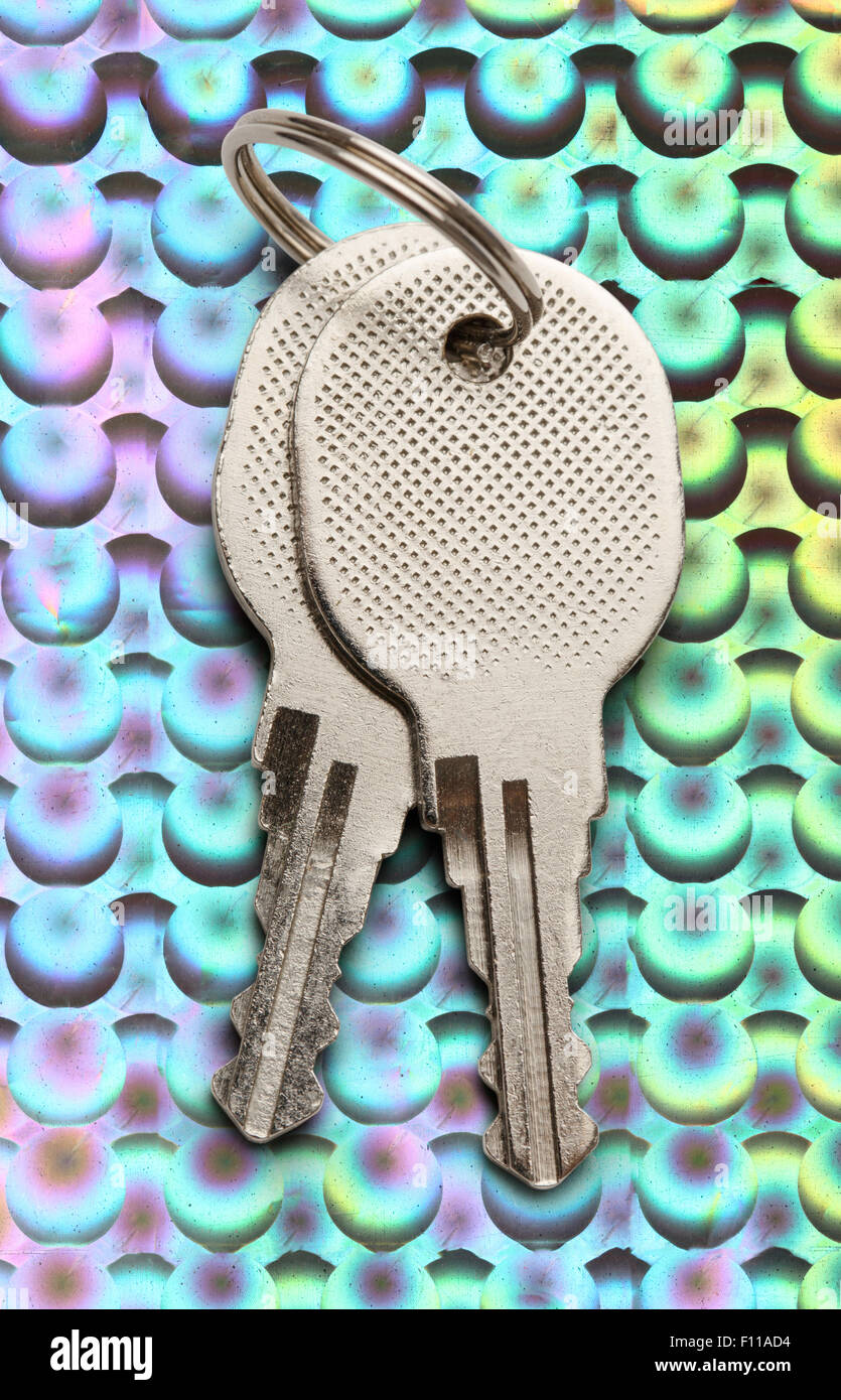 Two chrome keys on abstract background in closeup Stock Photo - Alamy