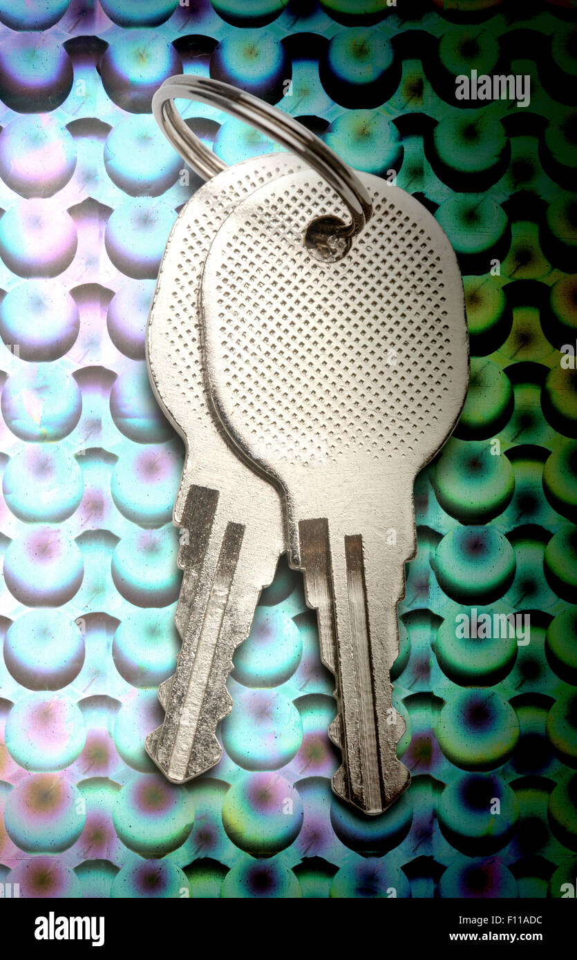 Two chrome keys on abstract background in closeup Stock Photo - Alamy