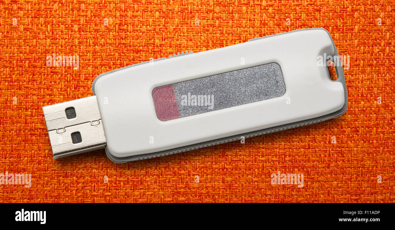 Usb flash drive on the cloth background Stock Photo - Alamy
