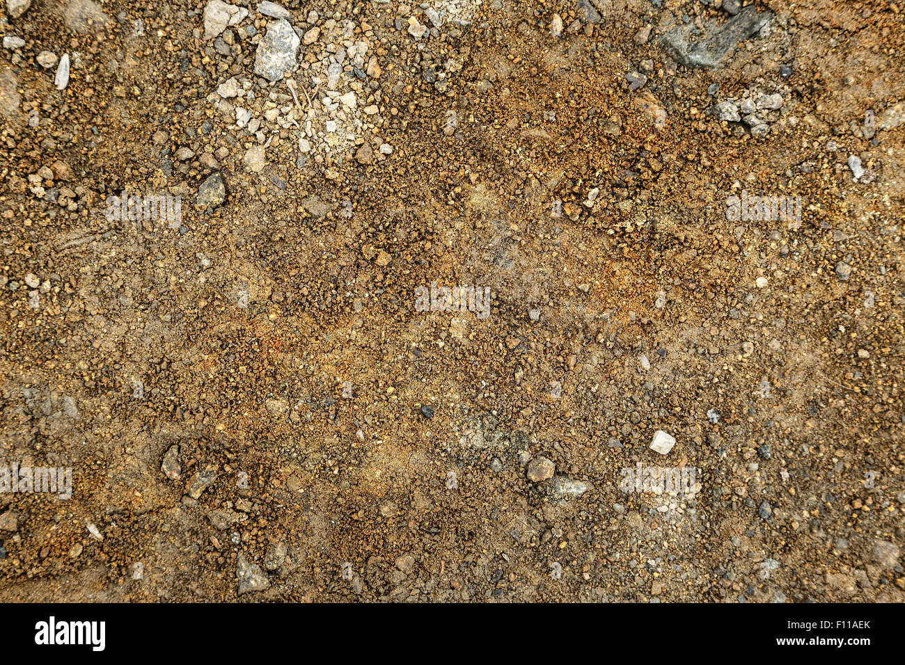 Brown ground surface as background in closeup Stock Photo - Alamy
