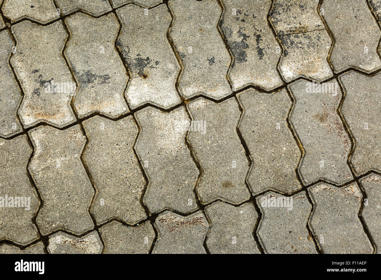 Cobblestone road as background in closeup Stock Photo - Alamy