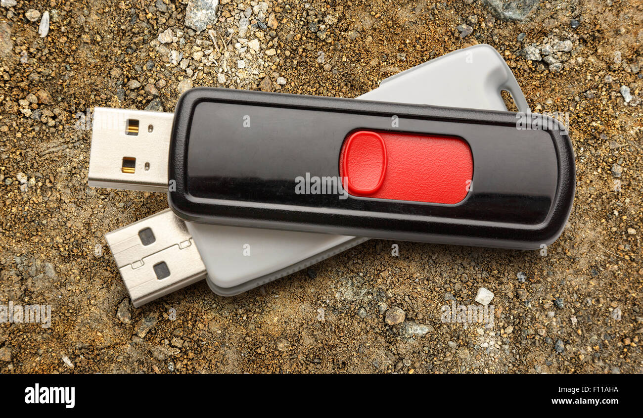 Usb flash drives on the ground background Stock Photo - Alamy