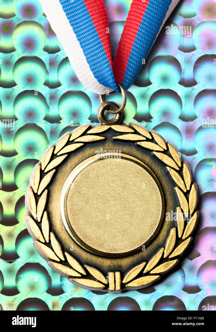 Metal medal with tricolor ribbon in closeup Stock Photo - Alamy