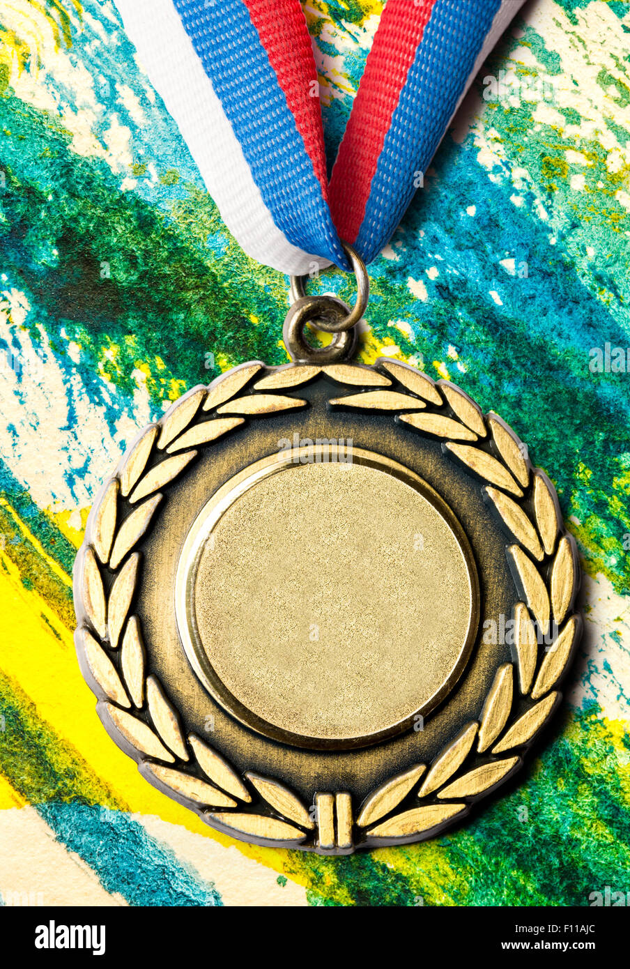 Metal medal with tricolor ribbon in closeup Stock Photo - Alamy