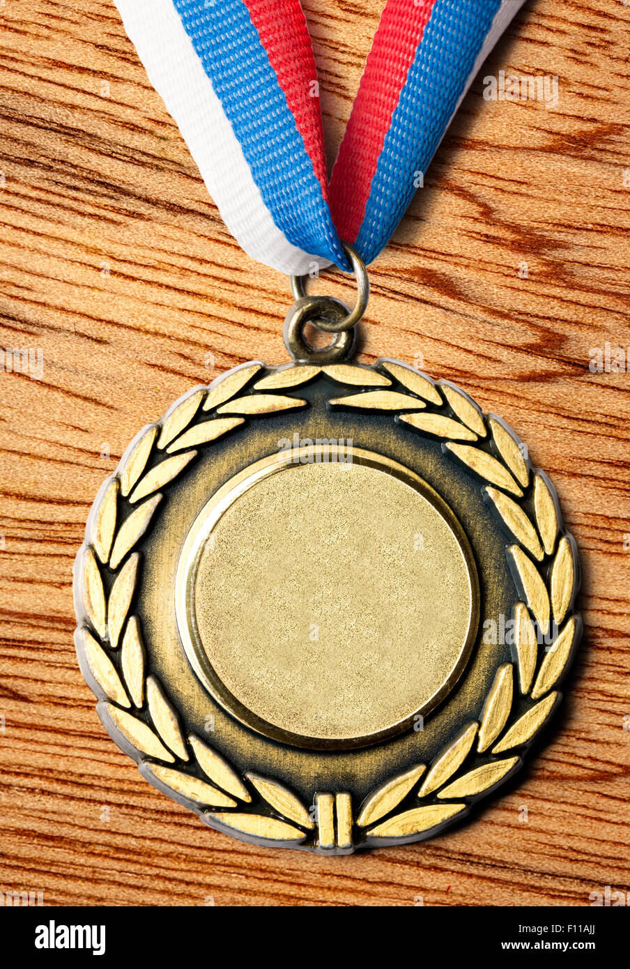 Metal medal with tricolor ribbon in closeup Stock Photo - Alamy