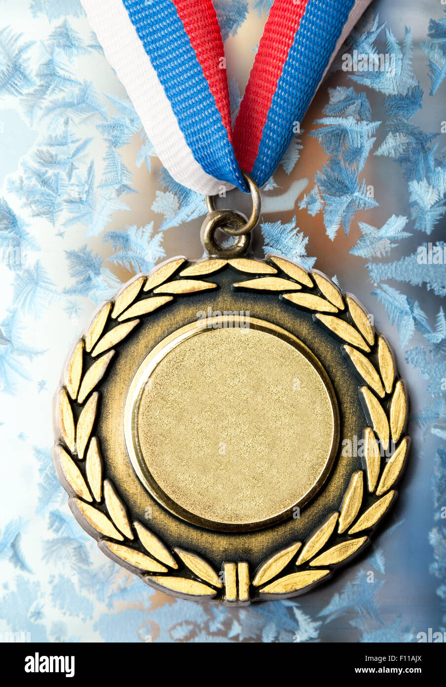Metal medal with tricolor ribbon in closeup Stock Photo - Alamy