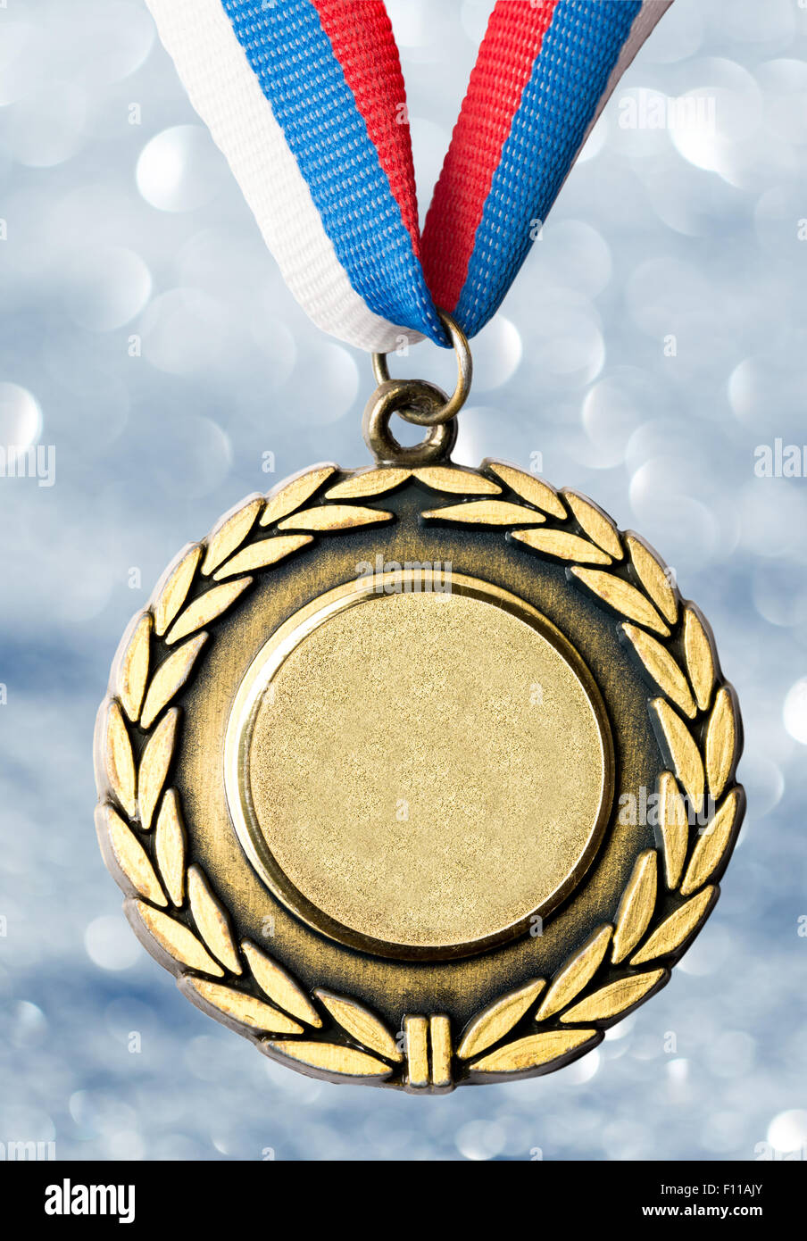 Metal medal with tricolor ribbon in closeup Stock Photo - Alamy