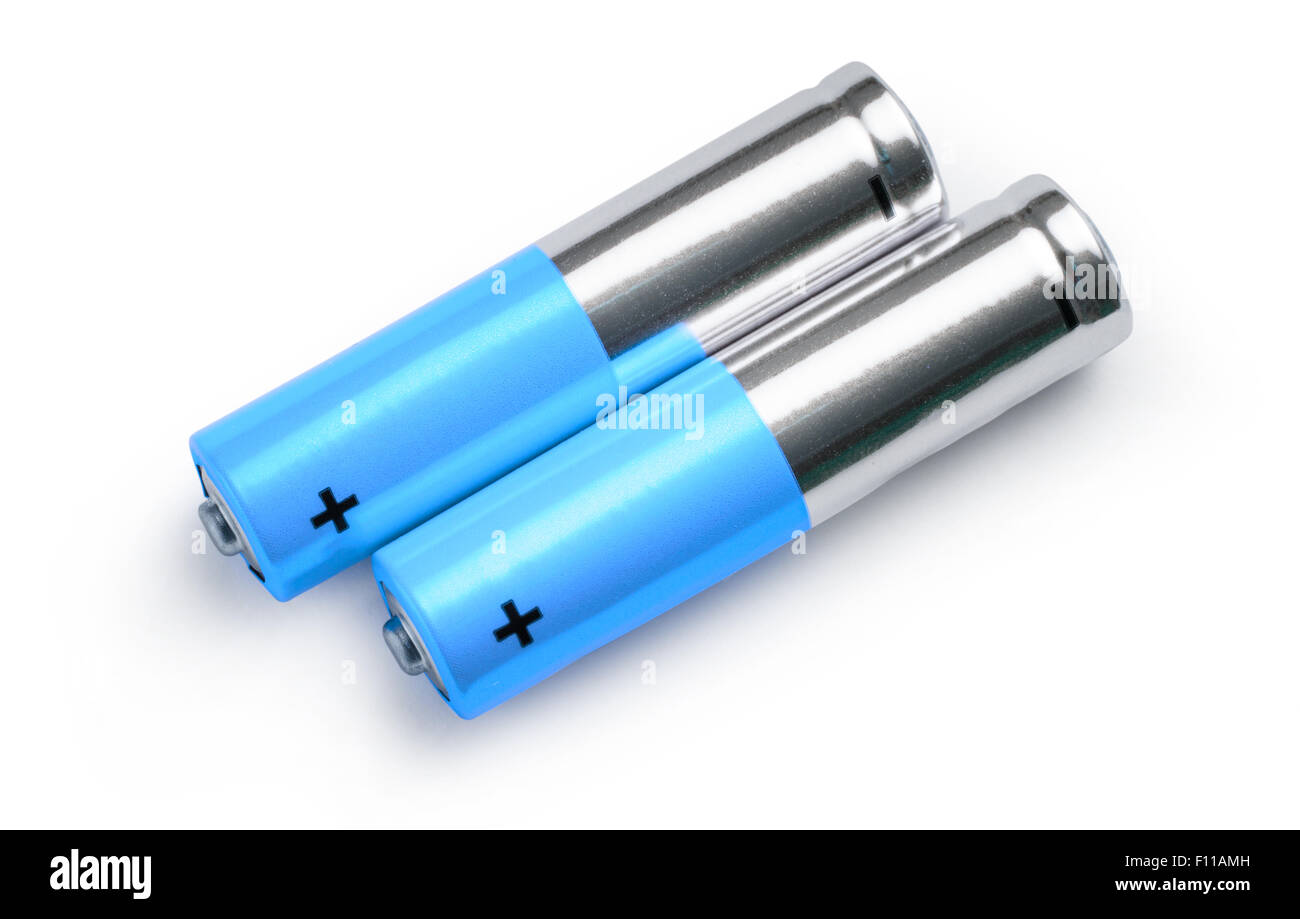 Two batteries with plus sign visible in closeup Stock Photo - Alamy