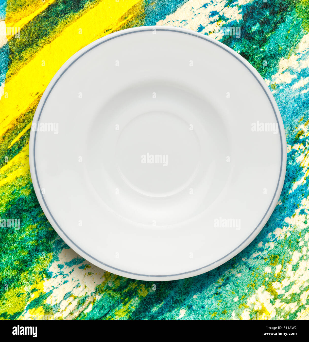 White plate in closeup on white background Stock Photo - Alamy