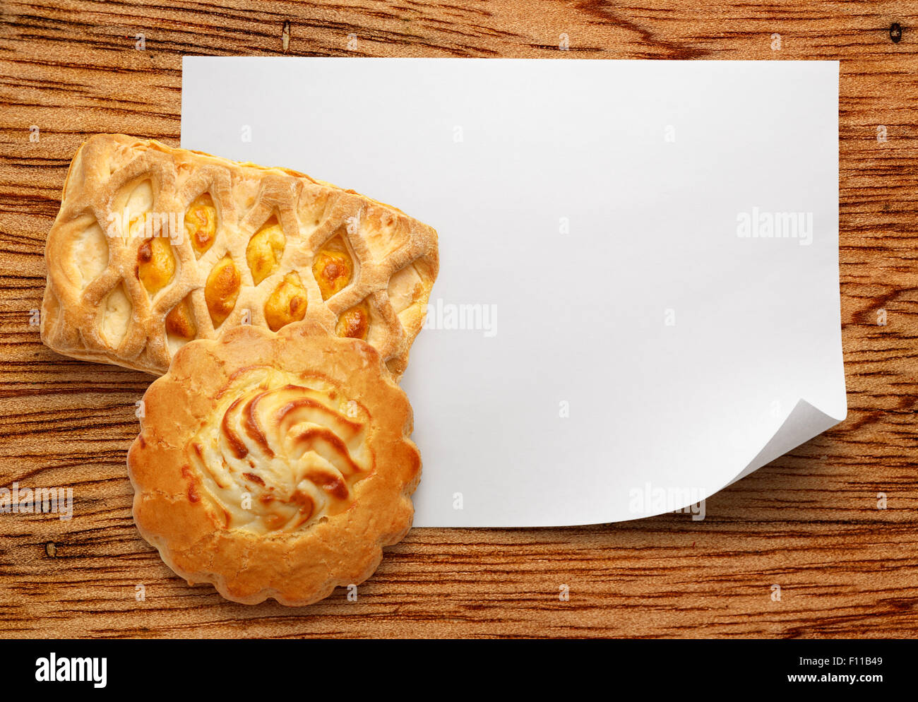 Blank white sheet of paper with fresh cakes Stock Photo - Alamy