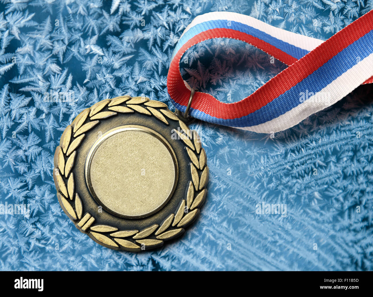 Metal medal with tricolor ribbon in closeup Stock Photo - Alamy