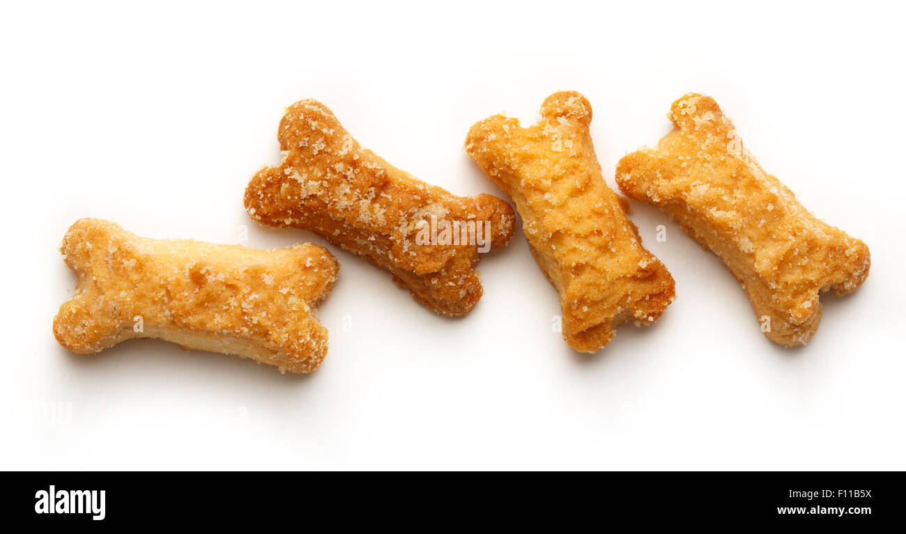 Pile of bone formed cookies on white background Stock Photo - Alamy