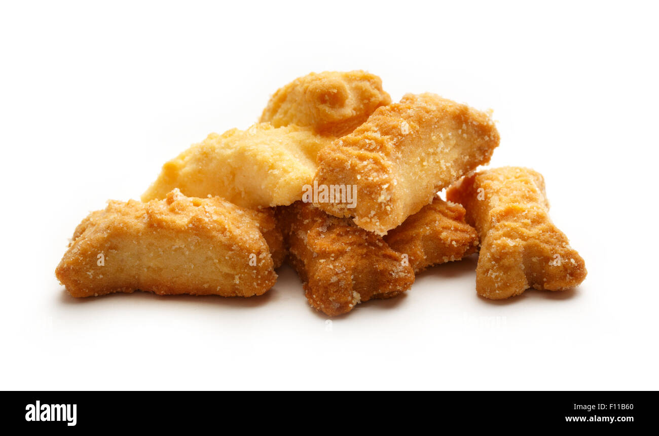 Pile of bone formed cookies on white background Stock Photo - Alamy