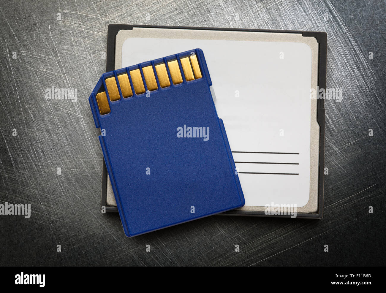 Blue compact memory card for camera on metal background Stock Photo - Alamy