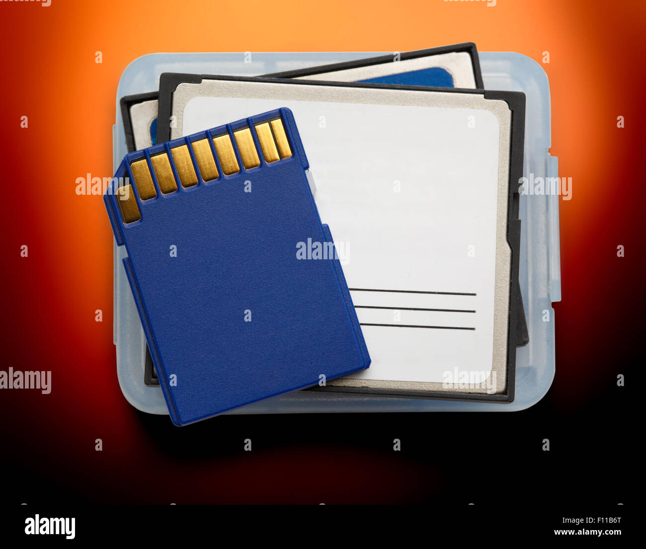 Blue compact memory cards for camera on blur background Stock Photo - Alamy