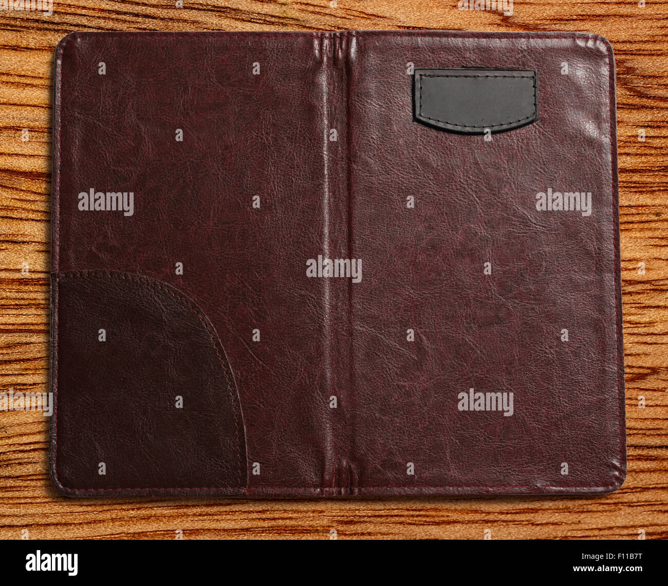 Open blank folder on the wooden background Stock Photo - Alamy