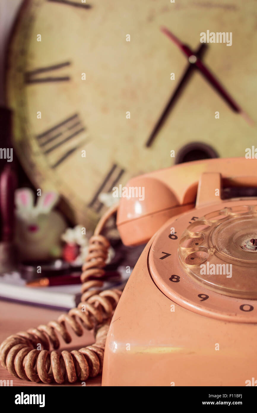 Phone old and vintage wood background Stock Photo - Alamy
