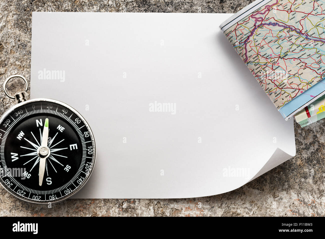 Folded map and compass hi-res stock photography and images - Alamy