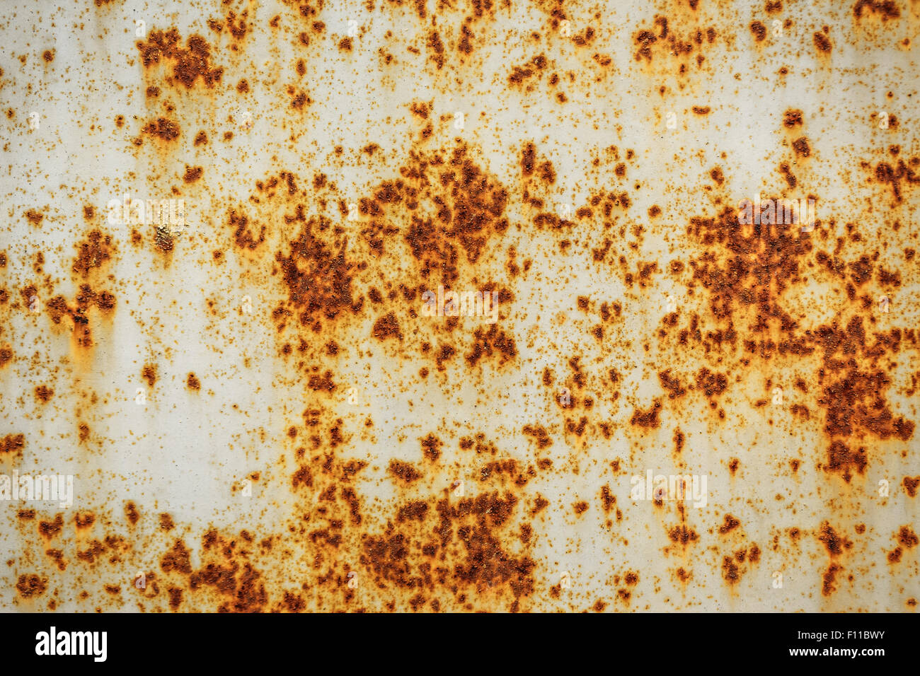 Rusty piece of metal as background in closeup Stock Photo - Alamy