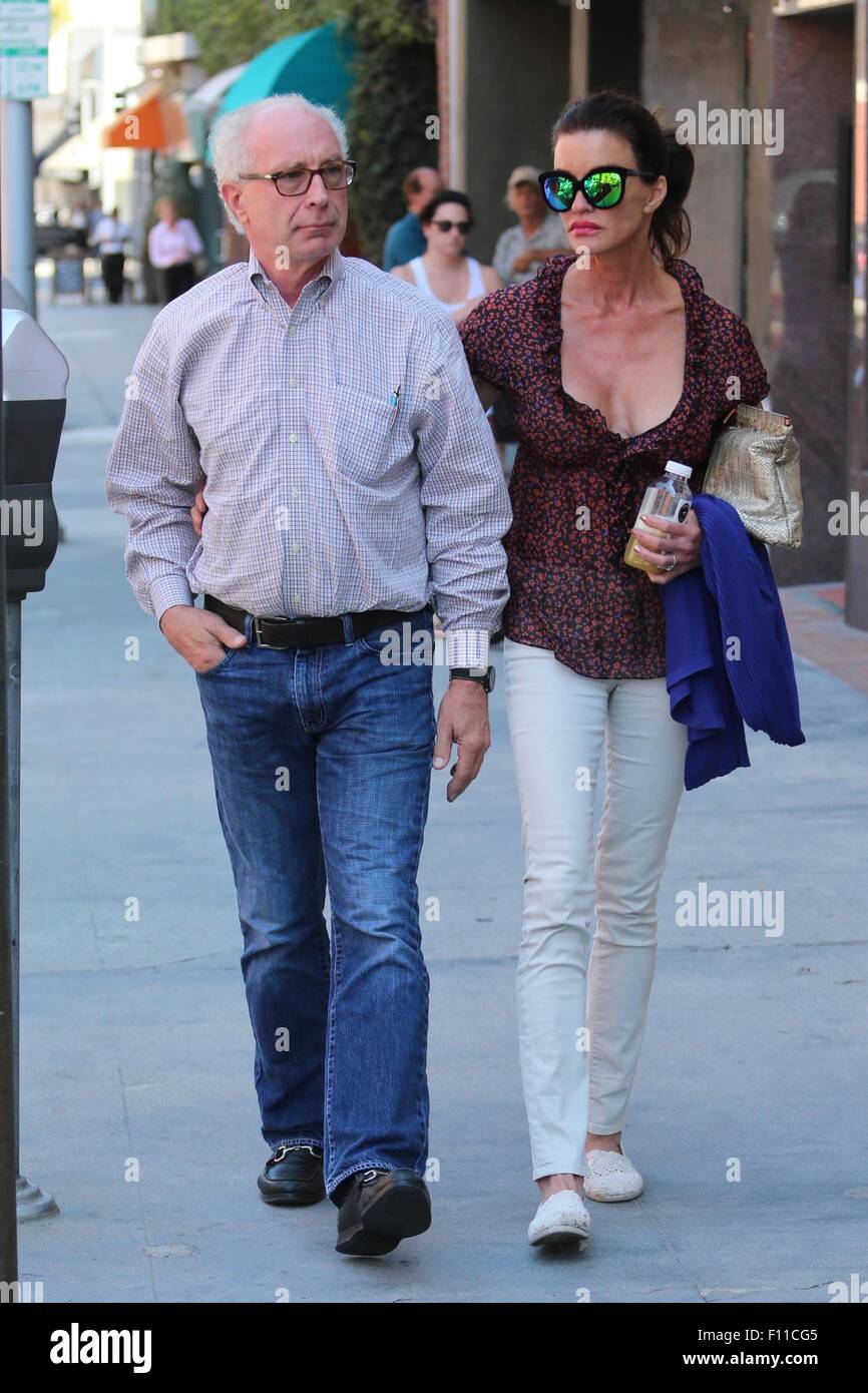 Janice Dickinson and her fiancé Dr Robert Gerner stroll together in ...