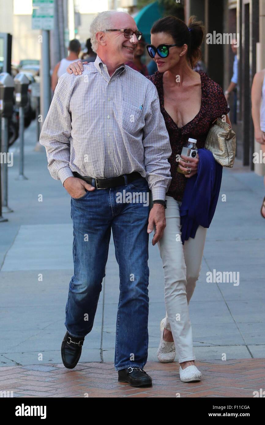 Janice Dickinson and her fiancé Dr Robert Gerner stroll together in ...