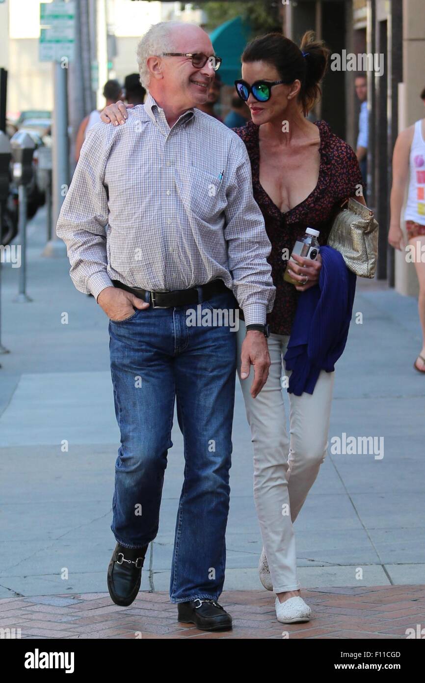 Janice Dickinson and her fiancé Dr Robert Gerner stroll together in ...