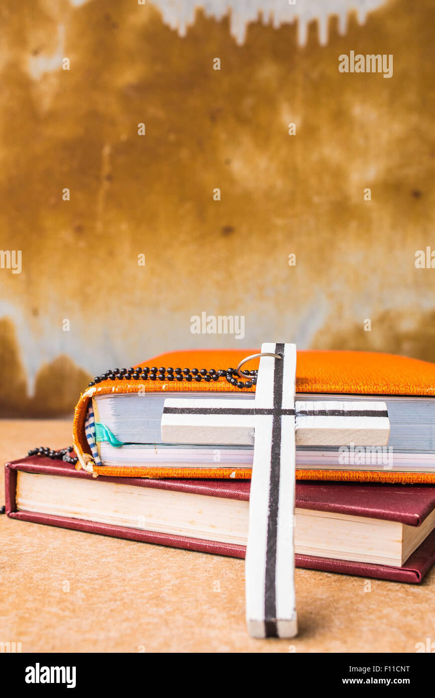 Crosses and books on a wooden Stock Photo - Alamy