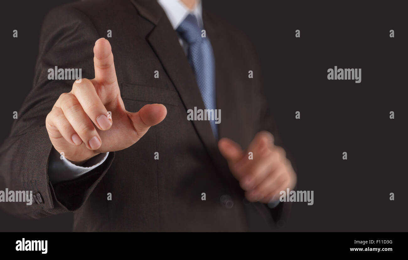 Businessman hand pressing an imaginary button on virtual screen Stock ...