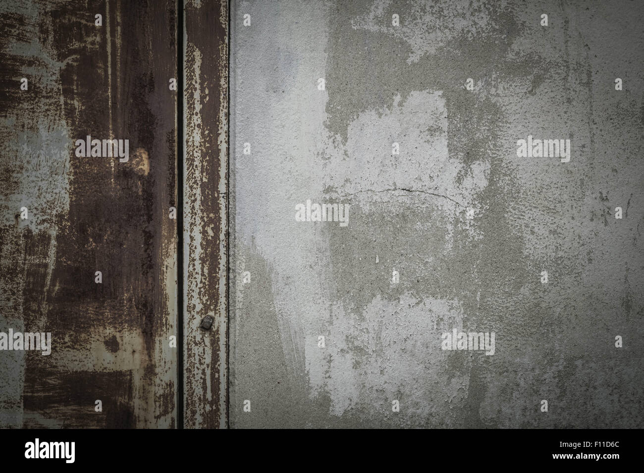 Background of old iron gates and concrete walls discolored Stock Photo ...