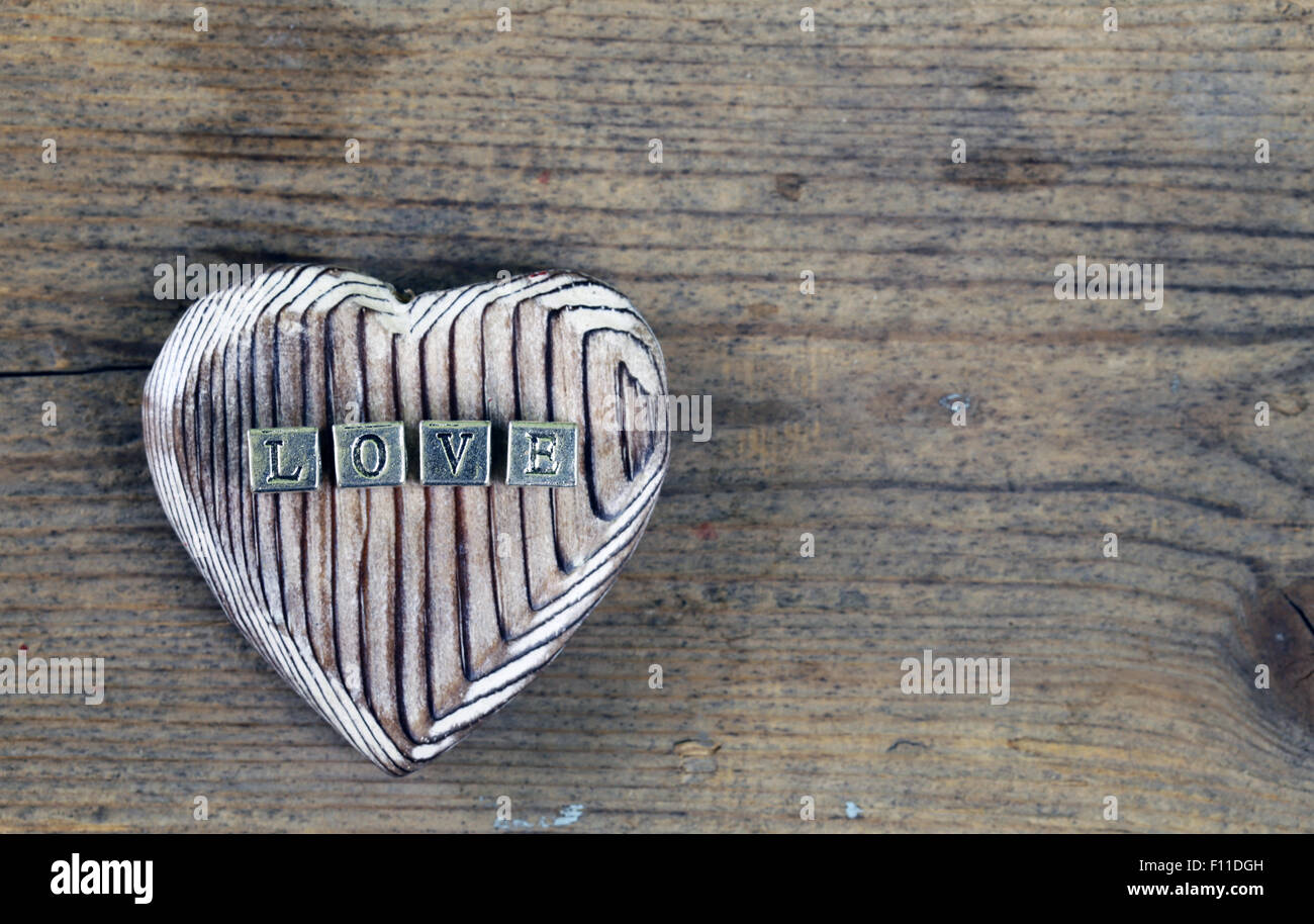 Word love written in metal hi-res stock photography and images - Alamy