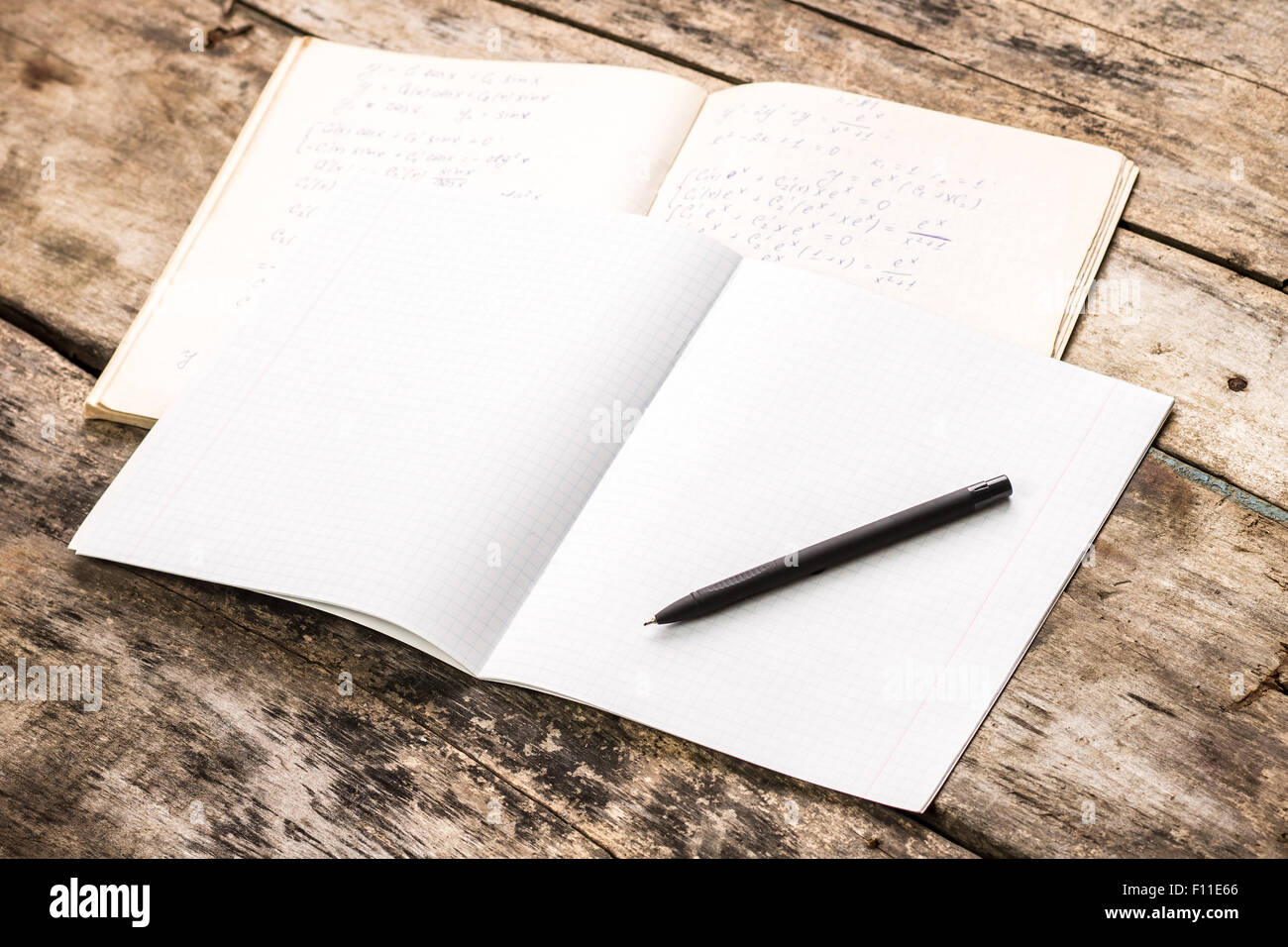 Open notebook with pen. Mathematics homework school background Stock ...