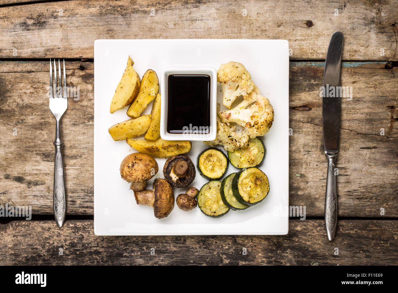Restaurant vegetarian menu background. Roasted vegetables with soy ...