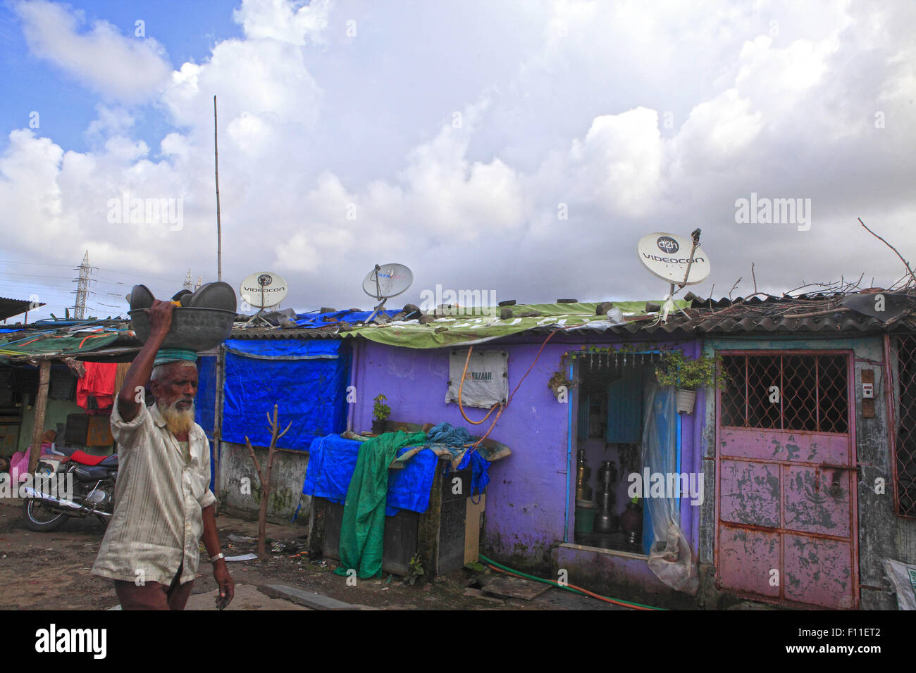 Dish tv antenna on slum hi-res stock photography and images - Alamy