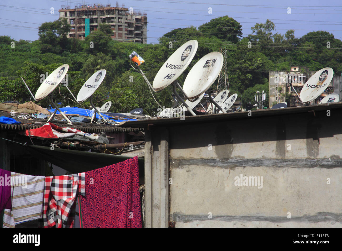 Dish tv antenna on slum hi-res stock photography and images - Alamy