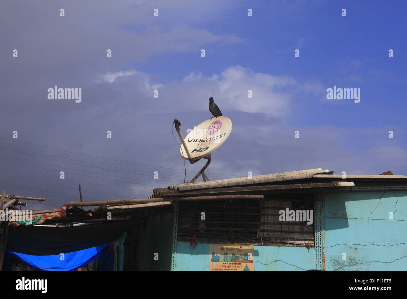 Dish tv antenna on slum hi-res stock photography and images - Alamy