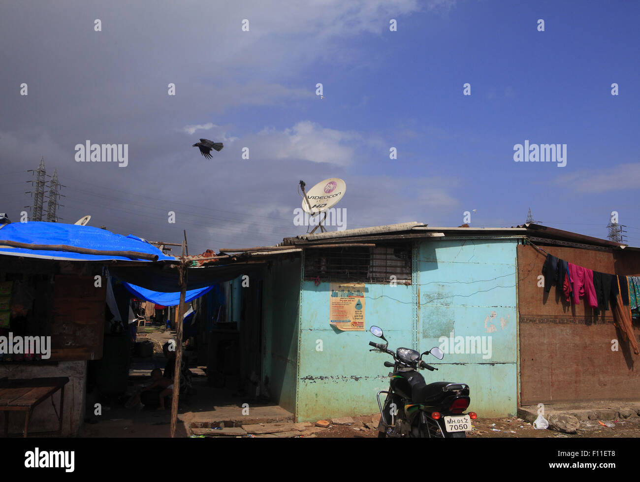 Dish tv antenna on slum hi-res stock photography and images - Alamy