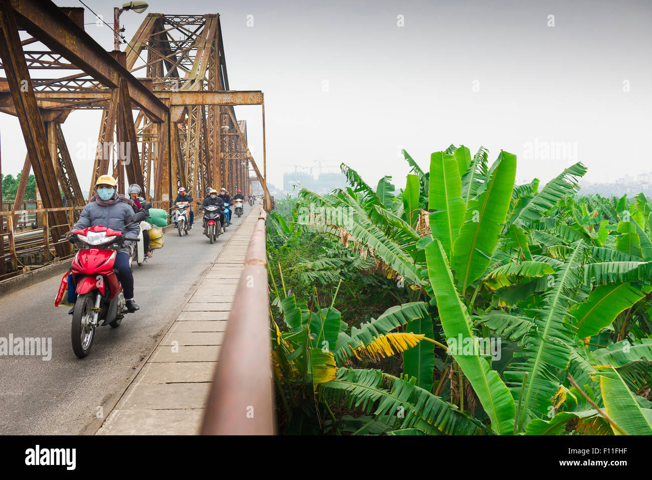 Hanoi bridge traffic, high above Hanoi's Red River early morning ...