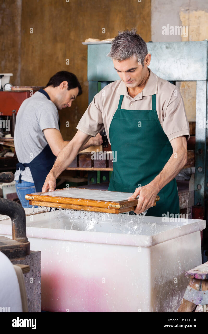 Wet paper pulp hi-res stock photography and images - Alamy