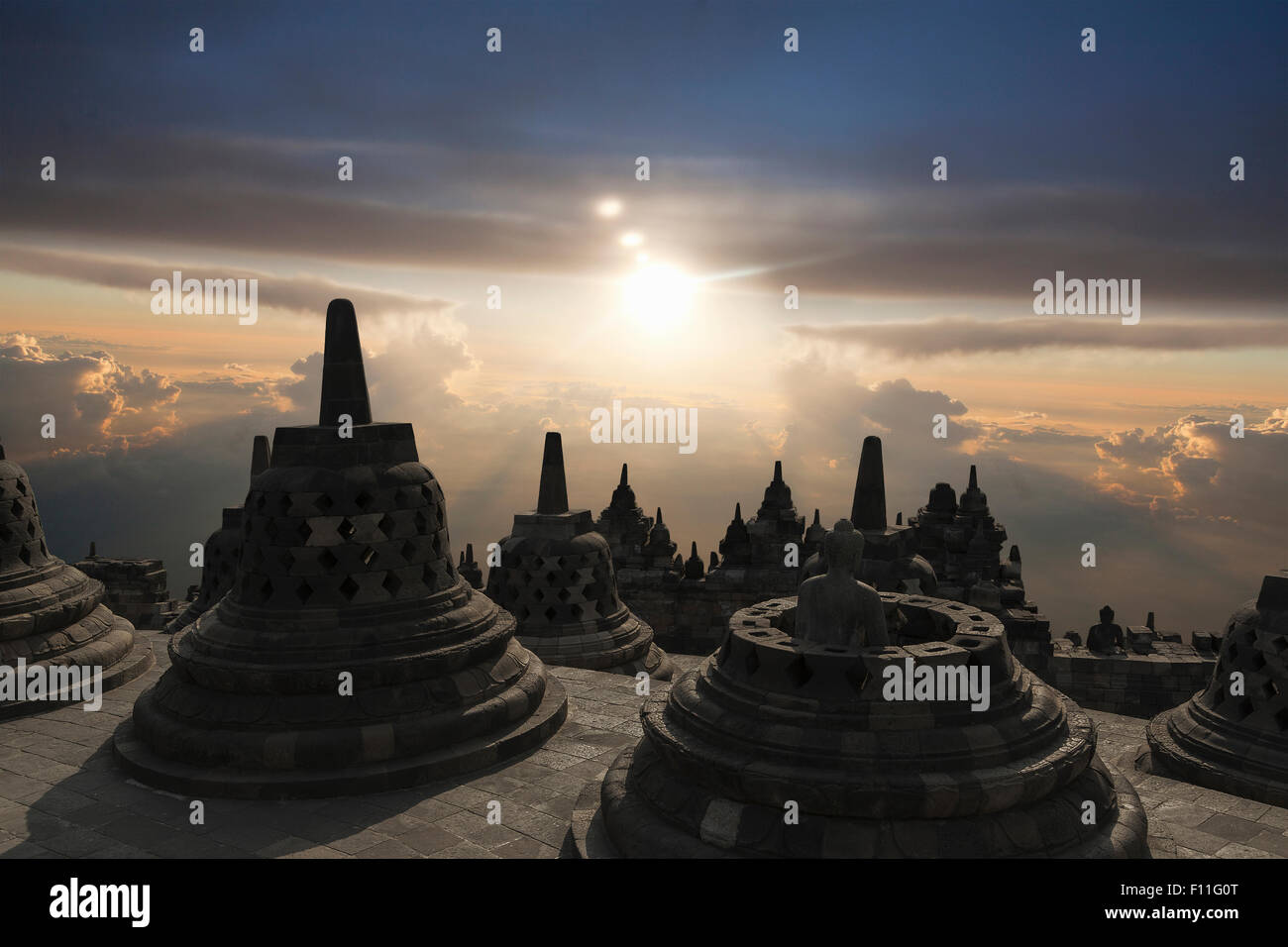 Spires on Temple of Borobudur at sunset, Borobudur, Indonesia Stock ...