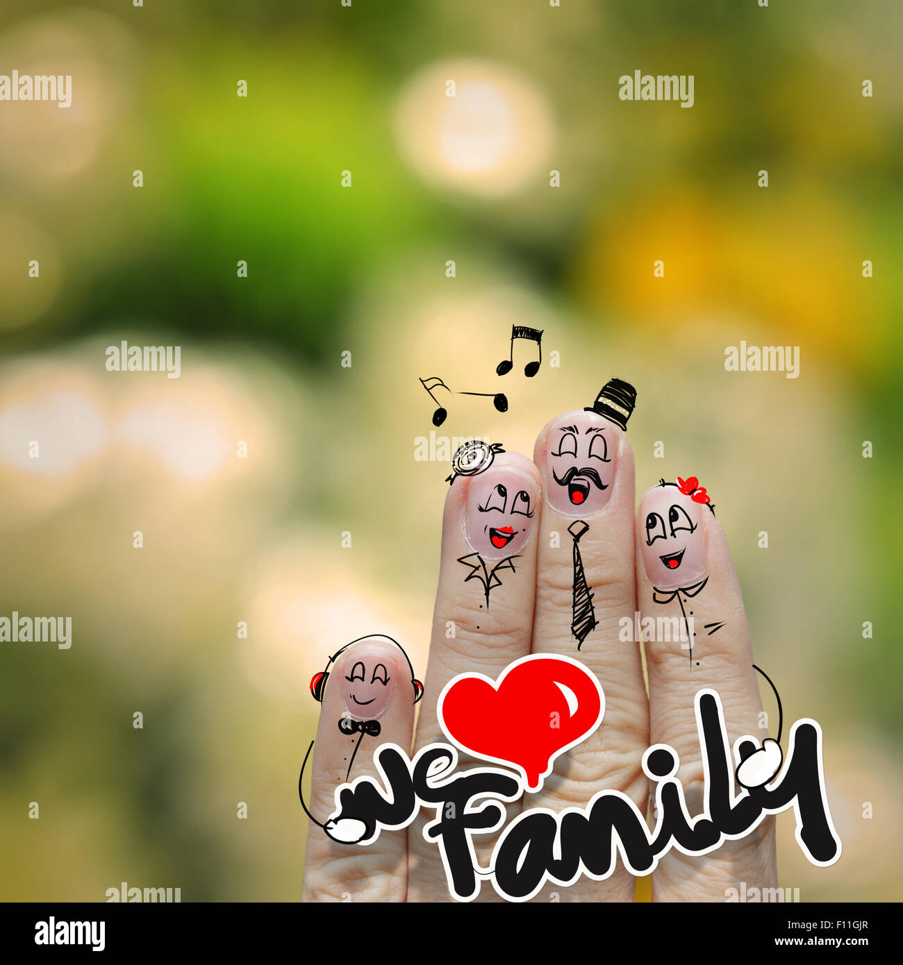 the happy finger family holding we love family word Stock Photo - Alamy