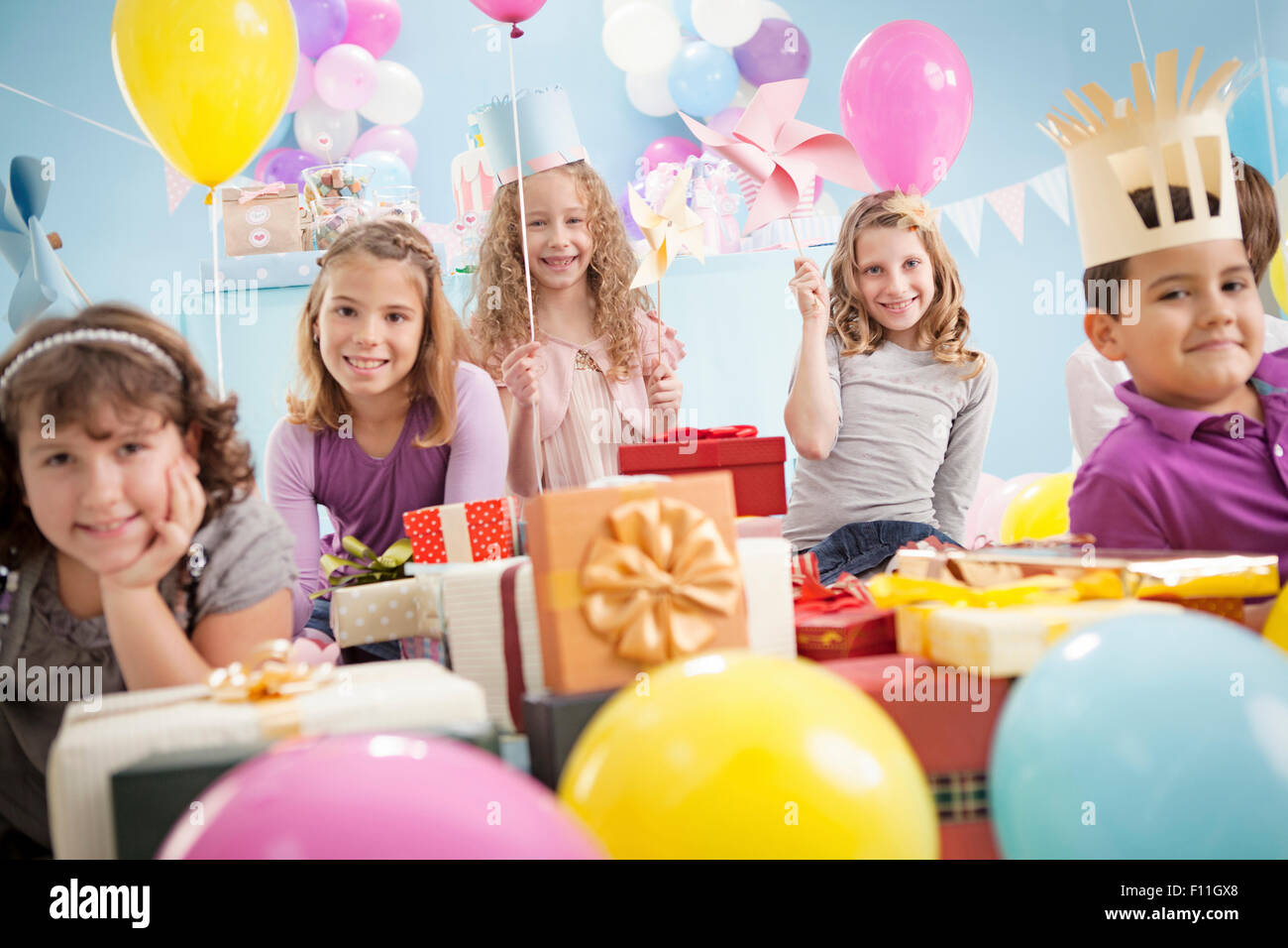 Children smiling at birthday party Stock Photo - Alamy