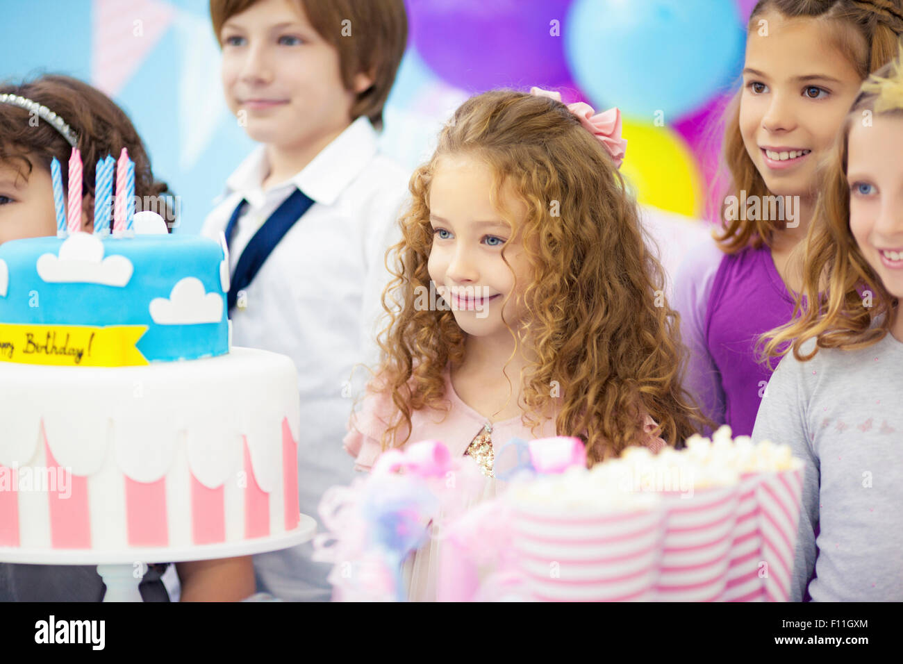 Children smiling at birthday party Stock Photo - Alamy