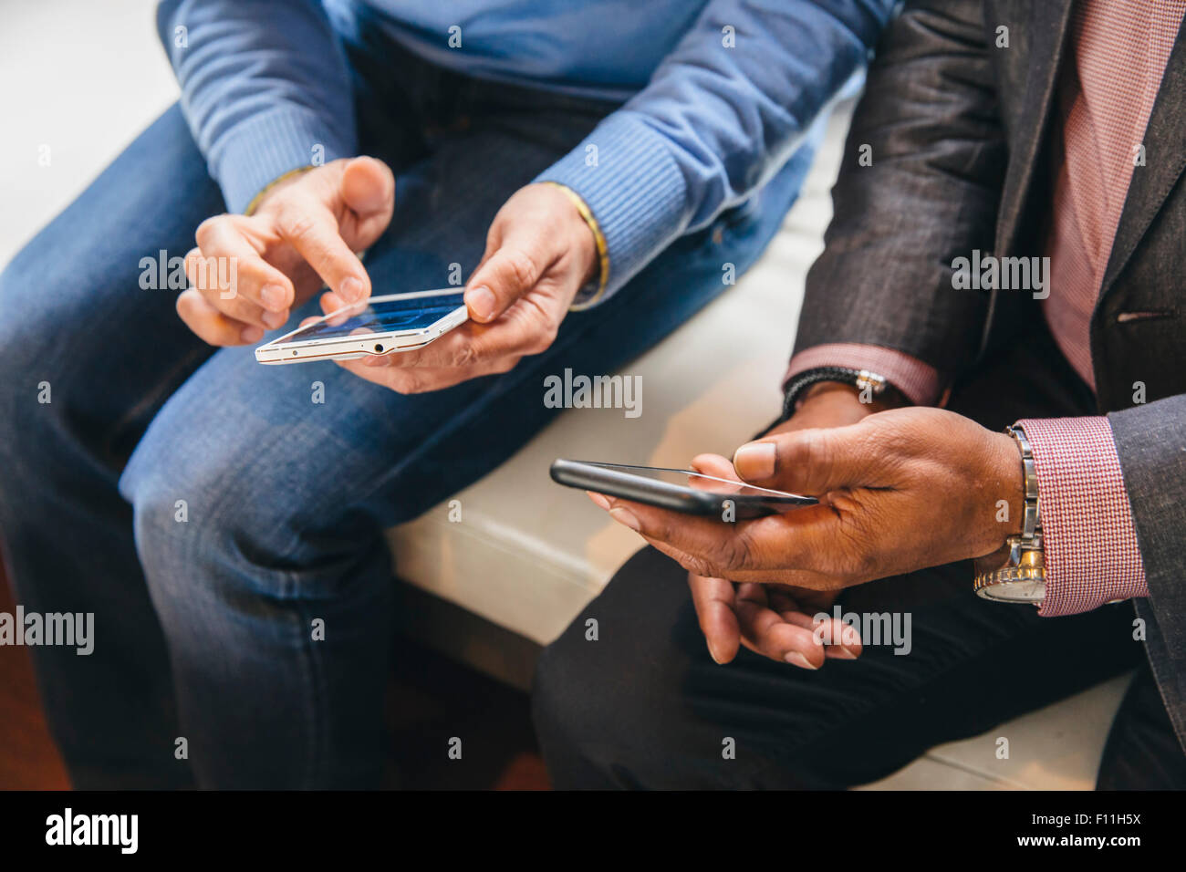 Midsection businessman using smart hi-res stock photography and images ...