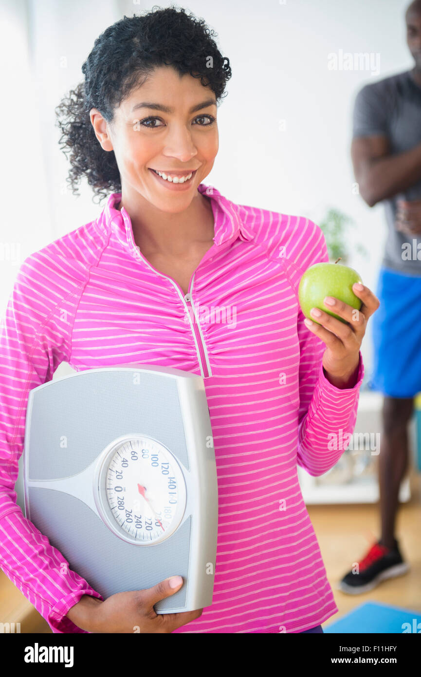 Scale woman hi-res stock photography and images - Alamy