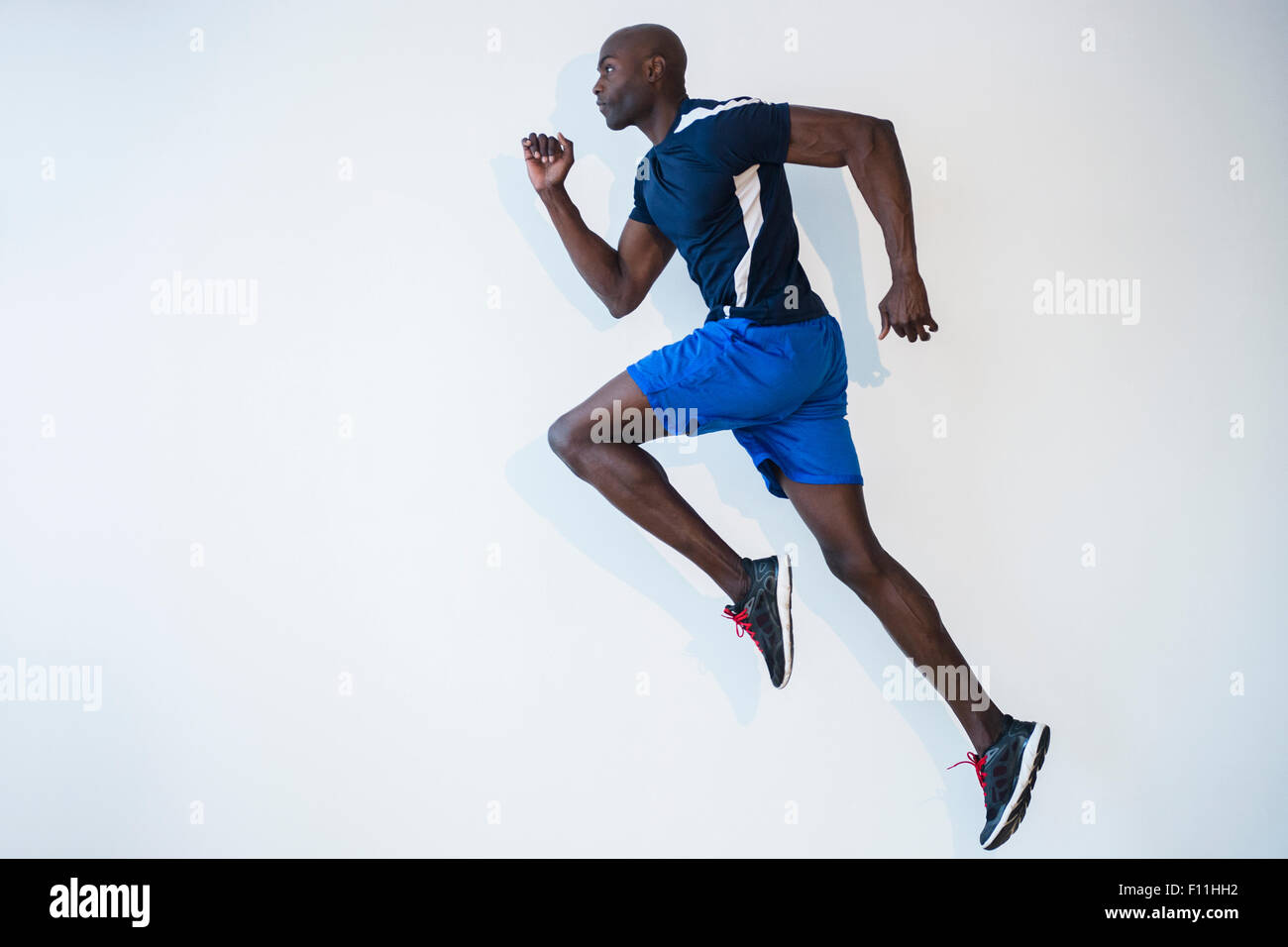 Bald man running hi-res stock photography and images - Alamy