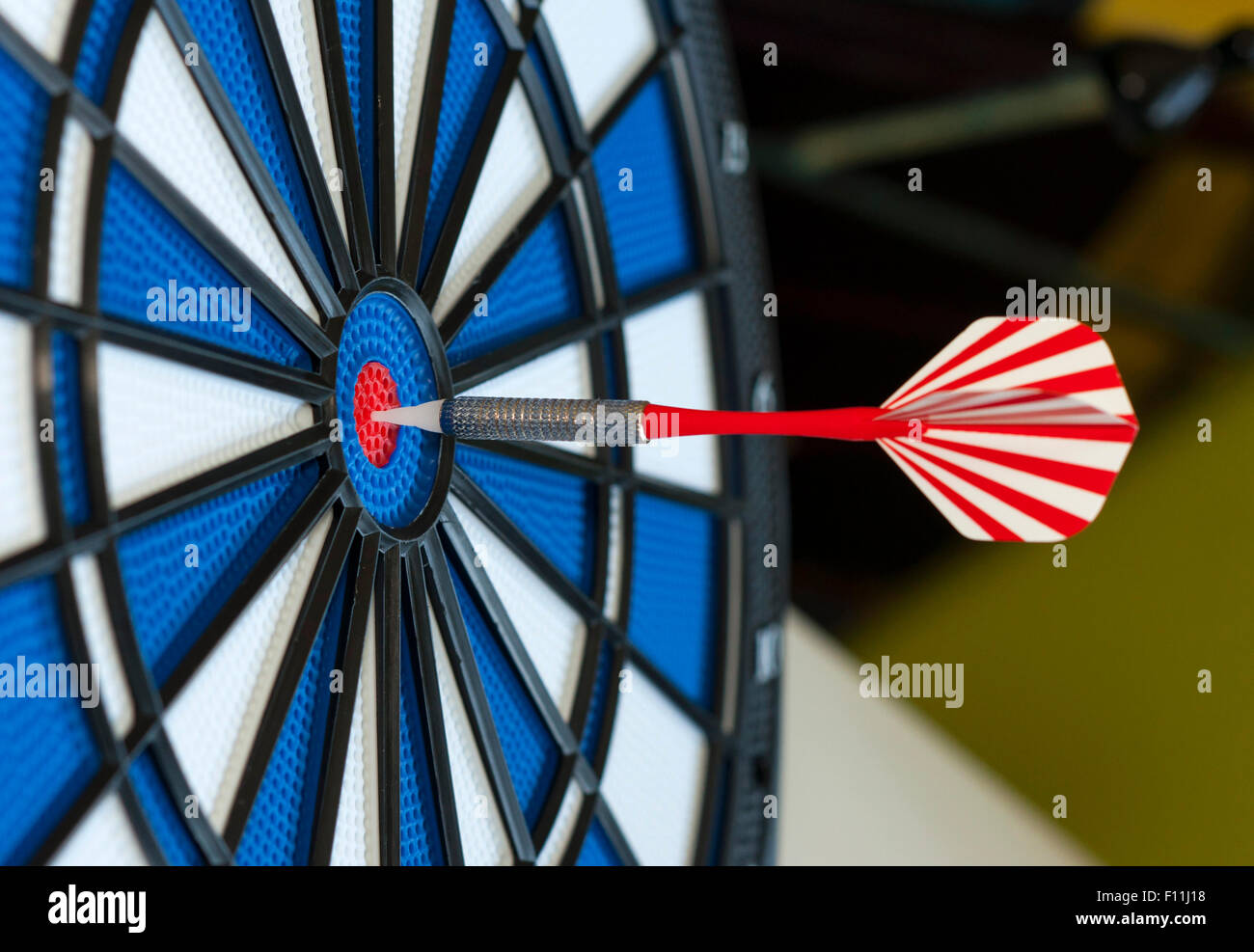 red darts arrows in the target center Stock Photo - Alamy