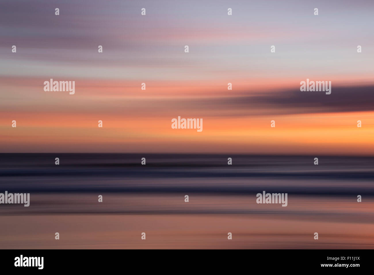 Surf on beach after sunset hi-res stock photography and images - Alamy