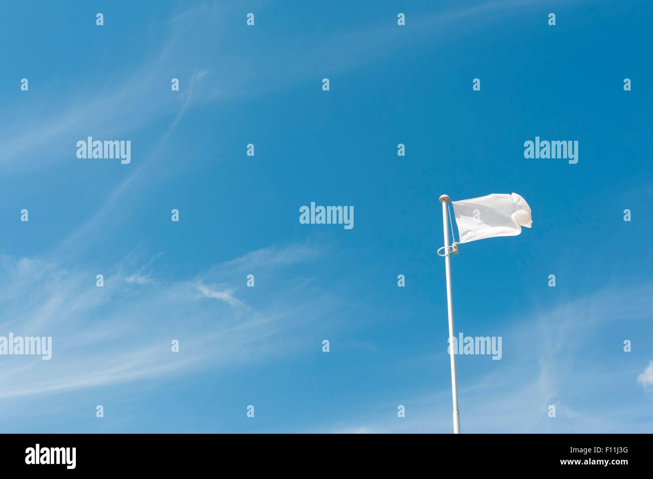 Plain white flag on flagpole hi-res stock photography and images - Alamy
