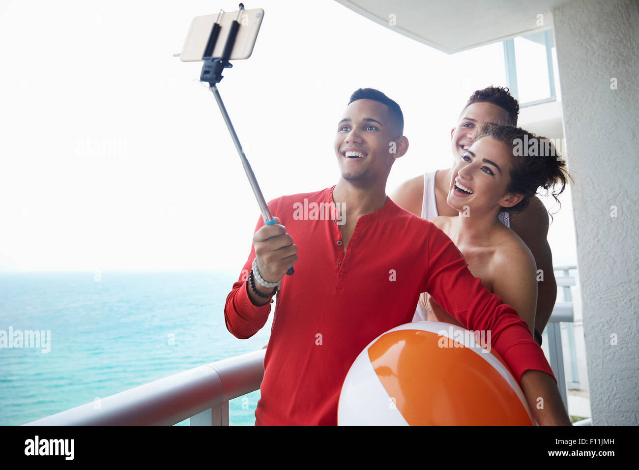 3 friends balcony hi-res stock photography and images - Alamy