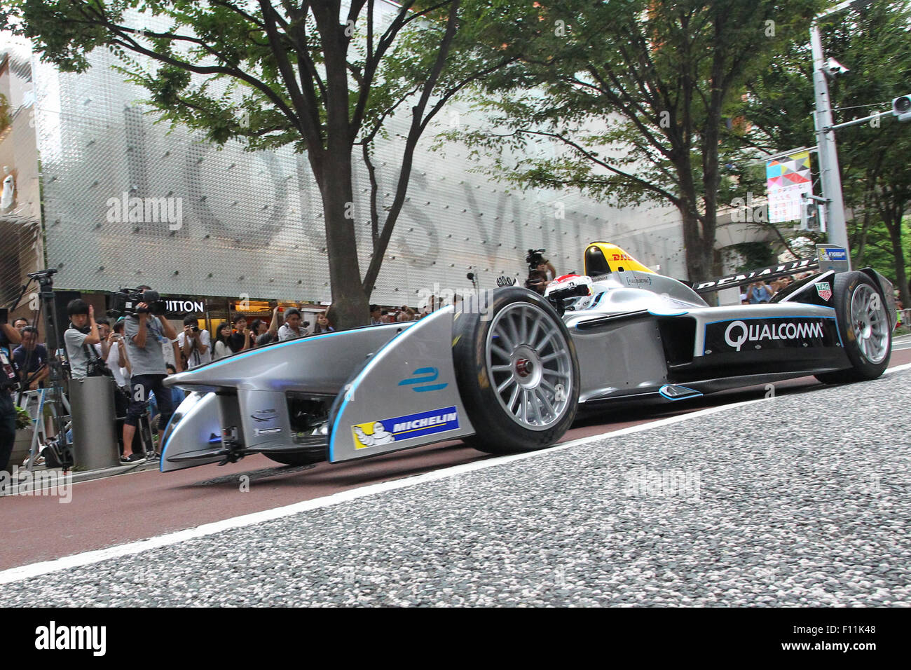 Formula E racing car demonstration drive event in Tokyo's Roppongi ...